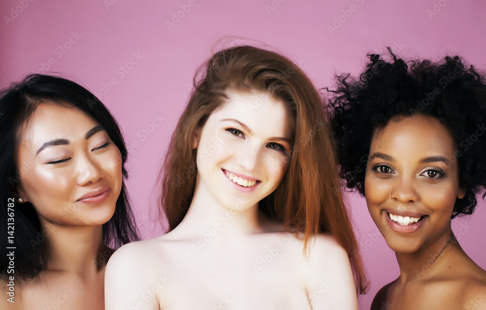 three different nation girls with diversuty in skin, hair. Asian ...