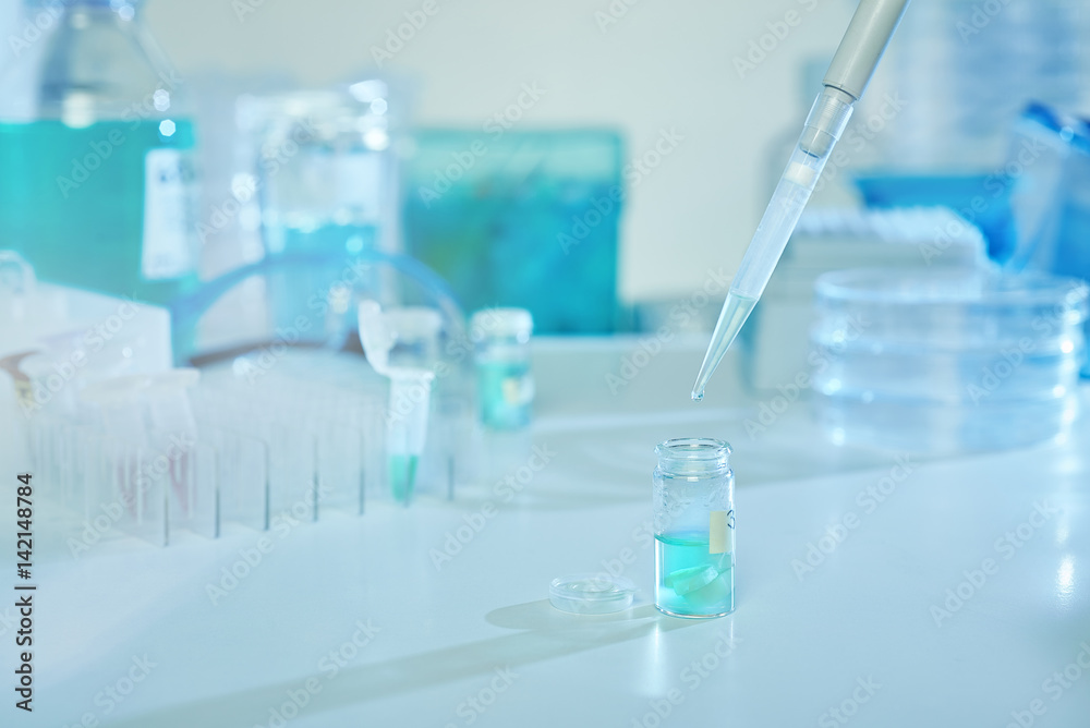 Liquid sample loading with automatic pipette, scientific background ...