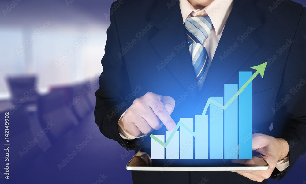 Double exposure businessman touching growth bar chart on financial ...