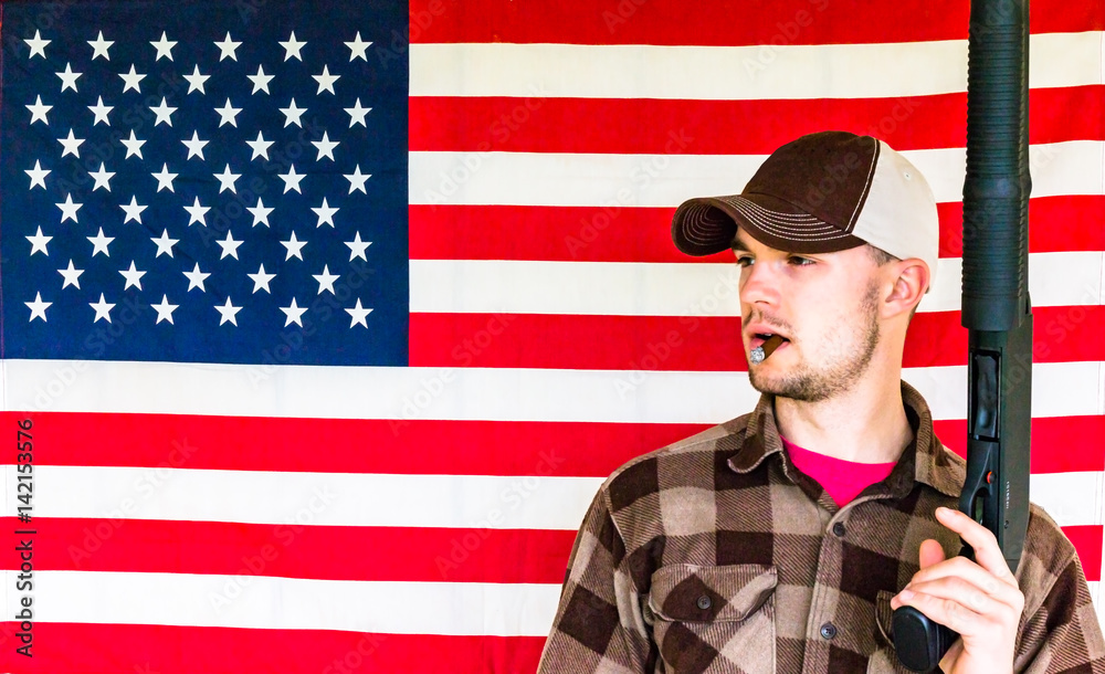 Young Man Holding Gun on American Flag Background Stock Photo | Adobe Stock