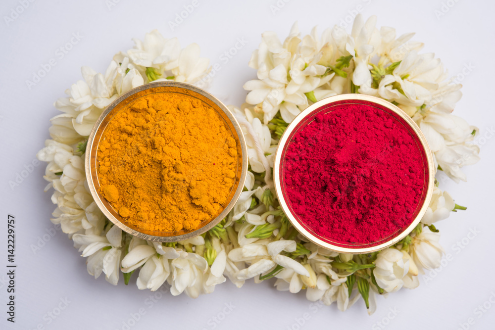 huldi kumkum or haldi-kumkum,indian hindu or punjabi woman applies on ...
