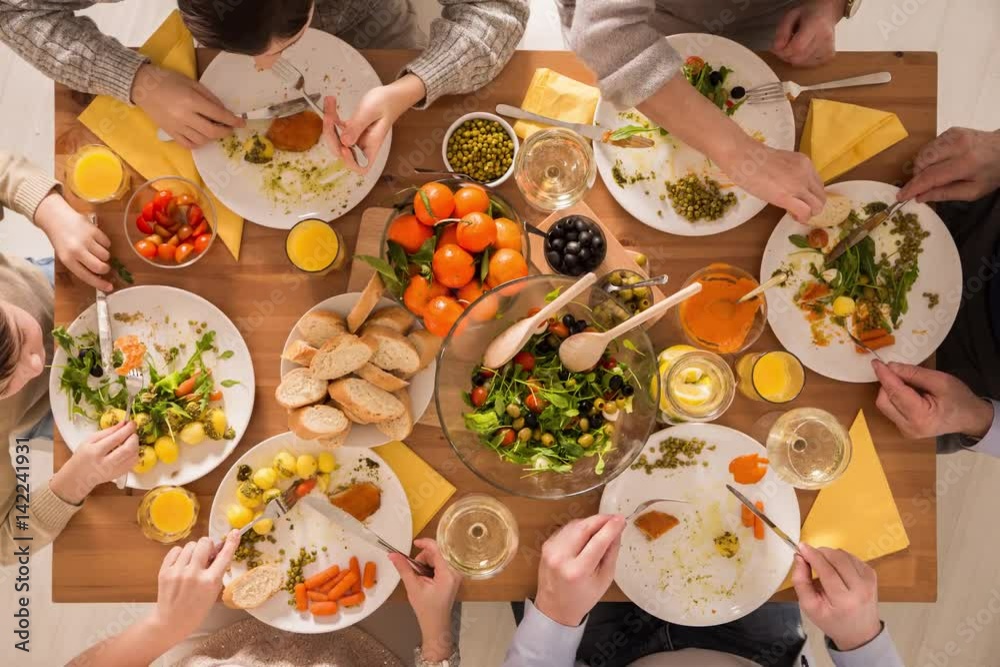 Big family eating dinner together Stock Video | Adobe Stock
