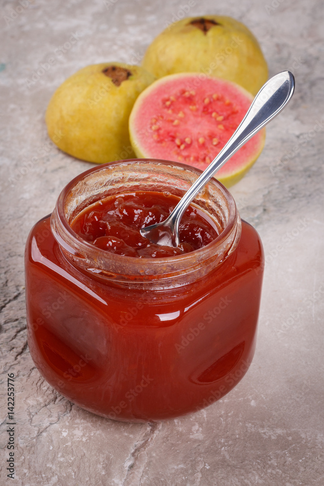 Brazilian dessert goiabada - jam of guava with fresh goiaba on gray ...