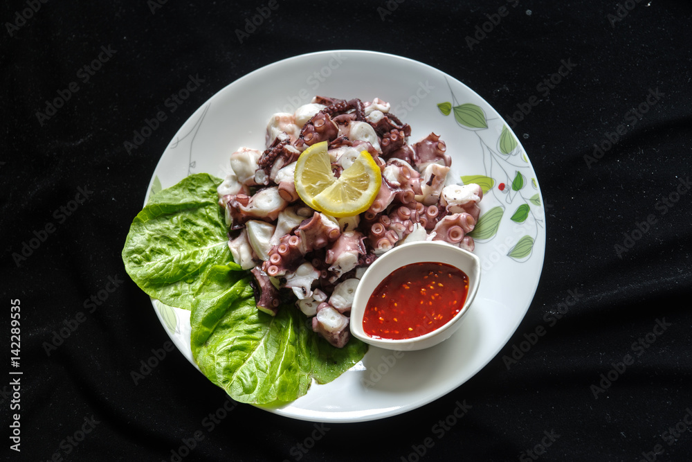 Korean cuisine Steamed octopus with red sauce Stock Photo | Adobe Stock