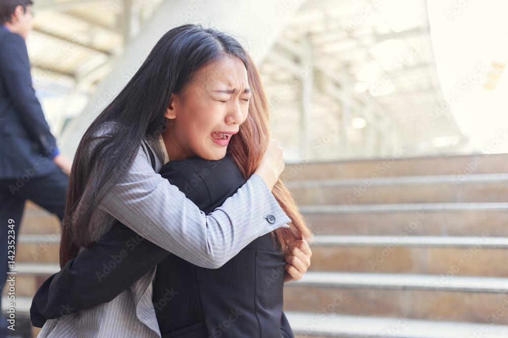 People Crying Together Stock Photo