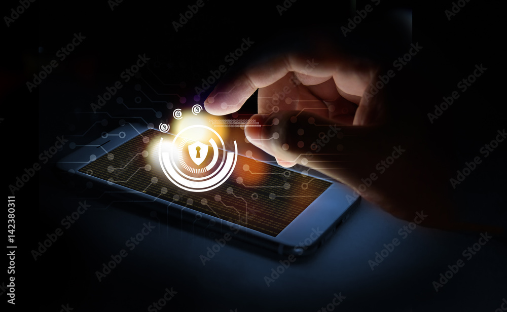 Cyber security network concept. Man Finger using smartphone with Shield ...