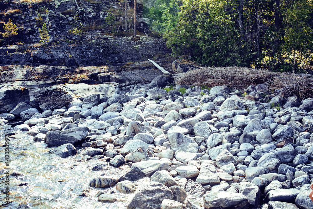 wild north nature landscape. lot of rocks on lake shore Stock Photo ...