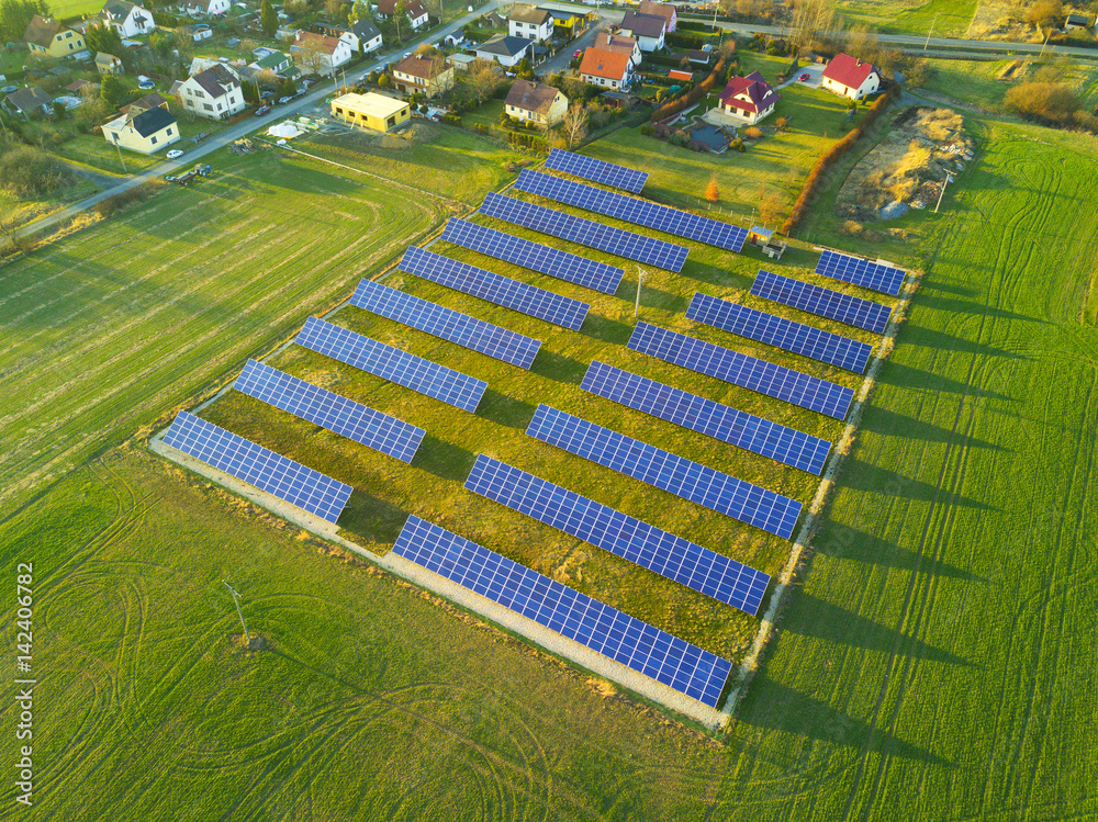 Aerial photo of solar power plant. Photovoltaic power station supplying ...