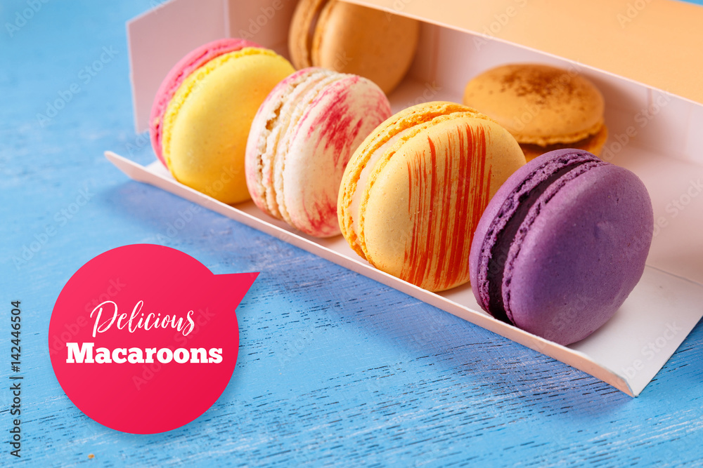 Macaroon cakes. Colored almond macaron cookies. Delivery box. Different ...