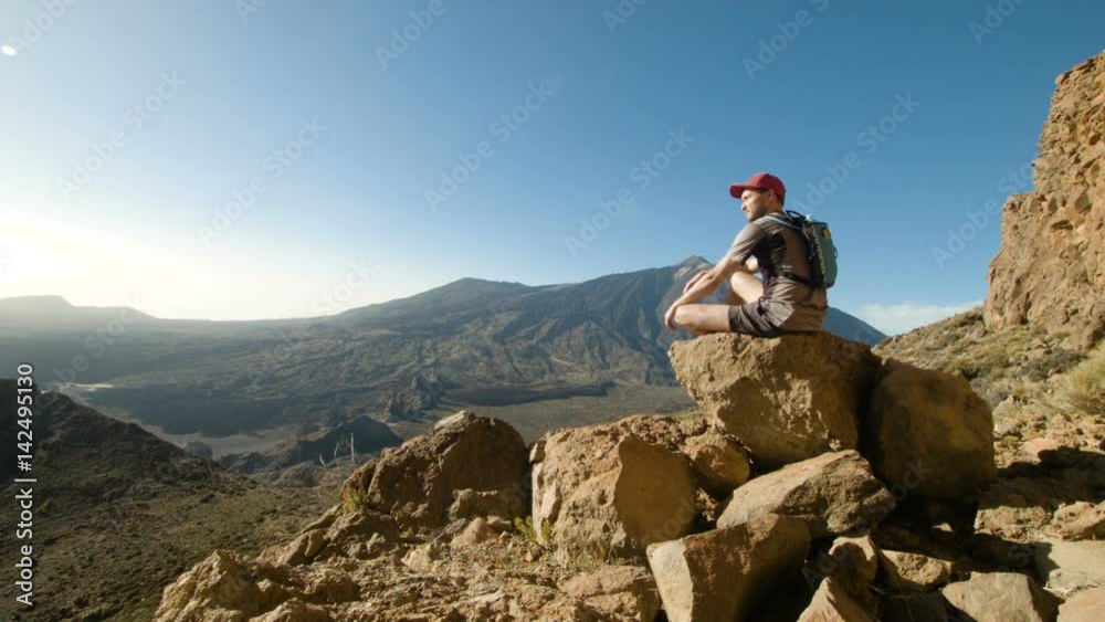 Mountain Hiking. Tired Young Man Sitting Still on a Rock Stock Video ...