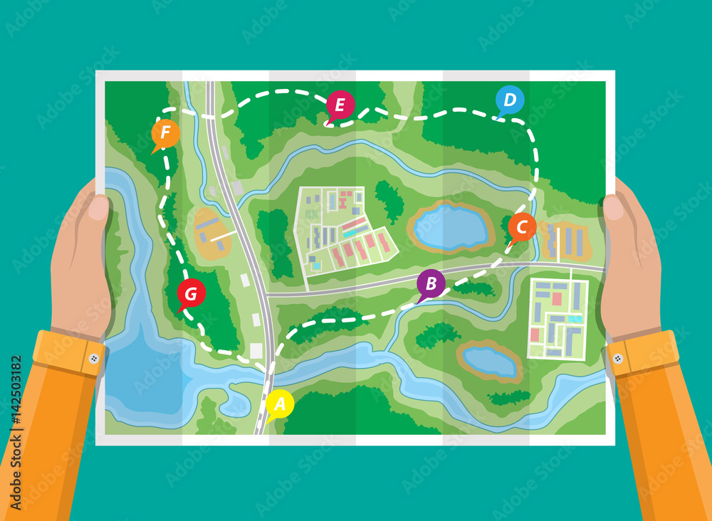 Folded paper city map in hands Stock Vector | Adobe Stock