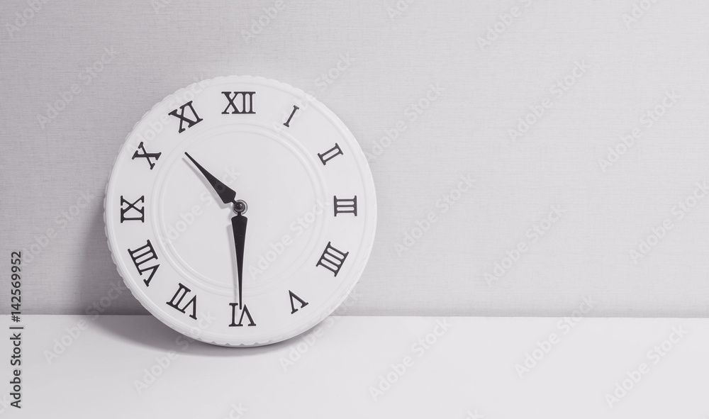 Closeup white clock for decorate show half past ten o'clock or 10:30 a ...