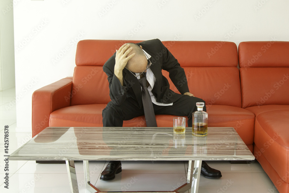 Poster Desperate and depressed man with black suit spending time with ...