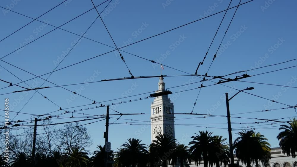 Video Stock San Francisco Ferry Building with bus and tram wires ...
