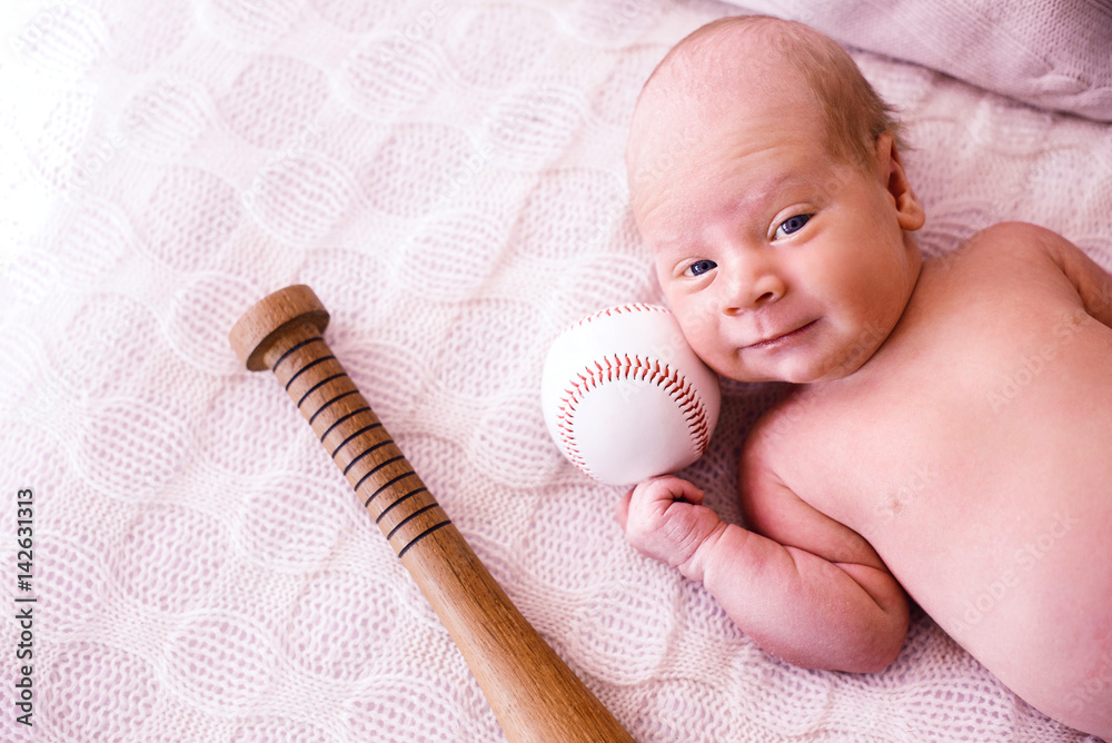 Newborn baby with baseball and bat Stock Photo | Adobe Stock