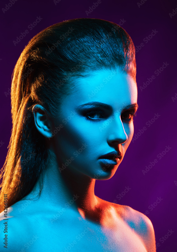 Portrait of a beautiful, seductive and young girl. Mixed and ...