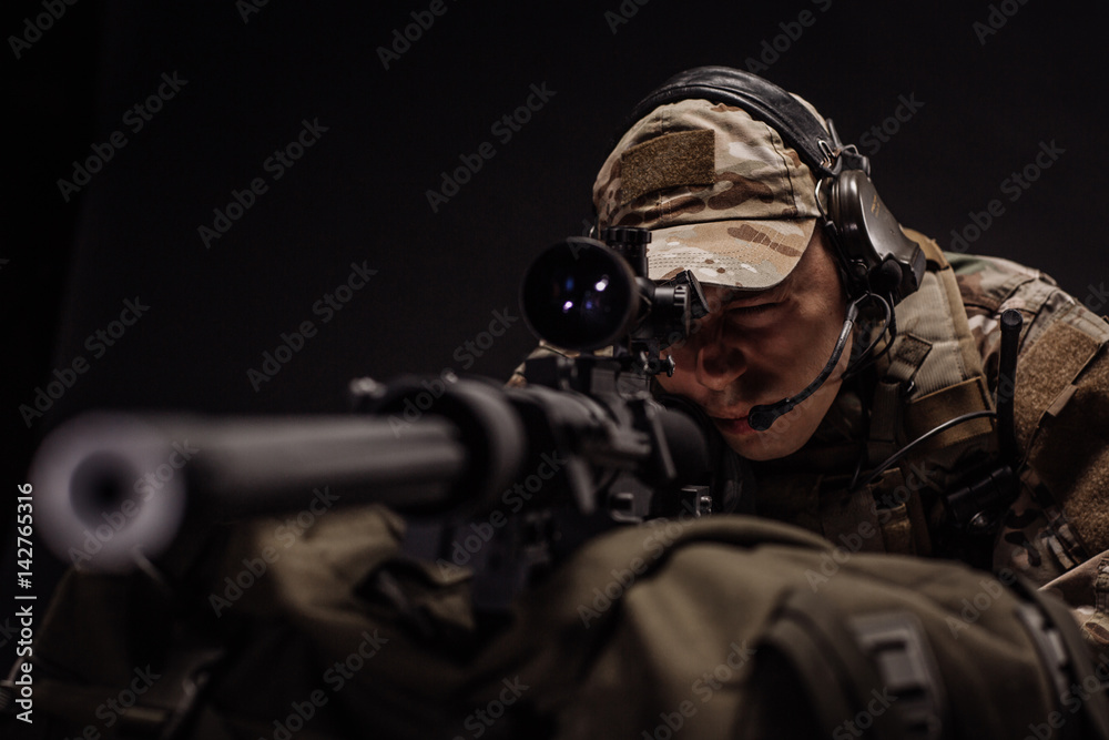 military contracto with his sniper rifle at night. war, army, weapon ...