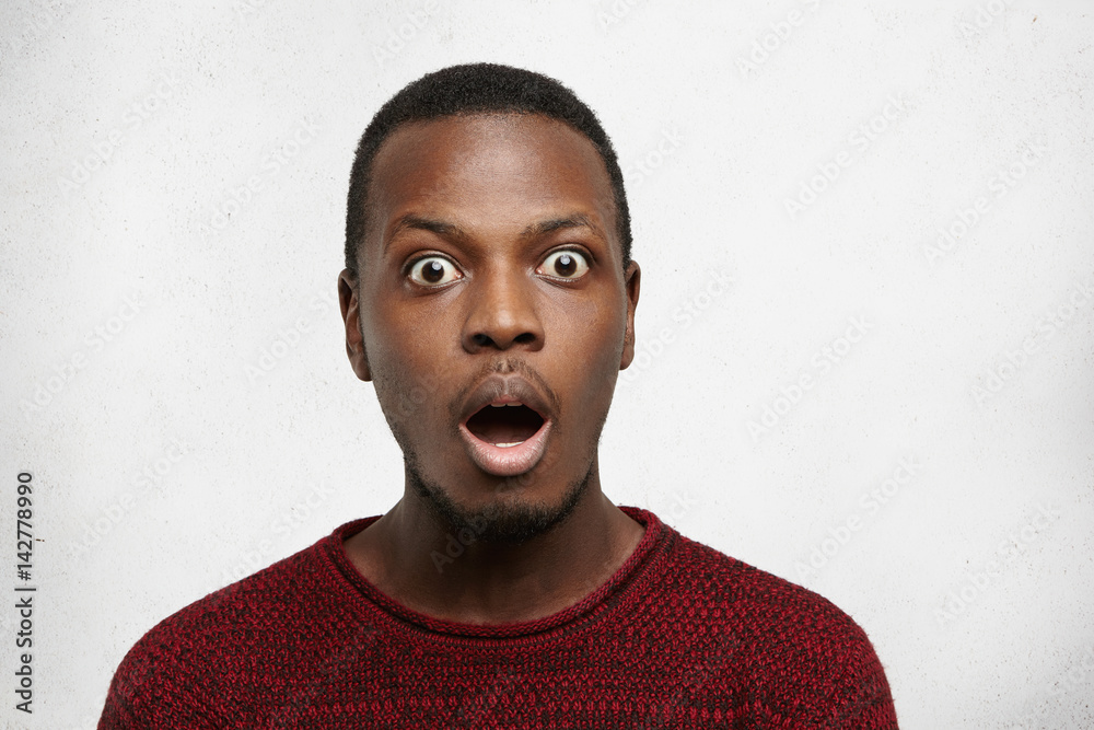 Are your serious? Isolated studio portrait of astonished bug-eyed young ...
