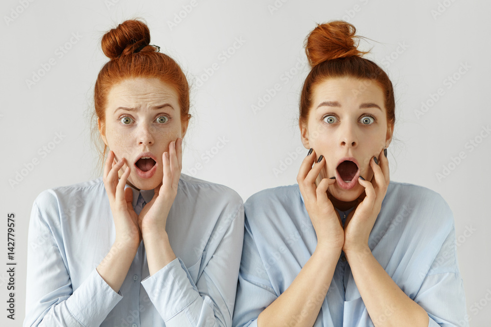 Portrait of scared clueless redhead female office workers wearing same ...