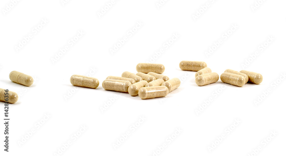 Drug capsule pills with beige medication in pile Stock Photo | Adobe Stock