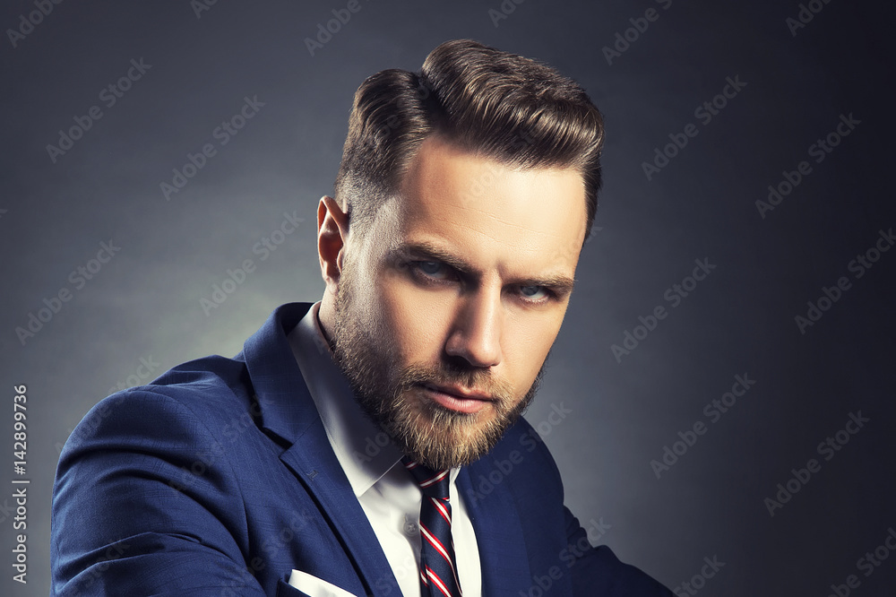 Young handsome caucasian man model with perfect hair style, beard and ...