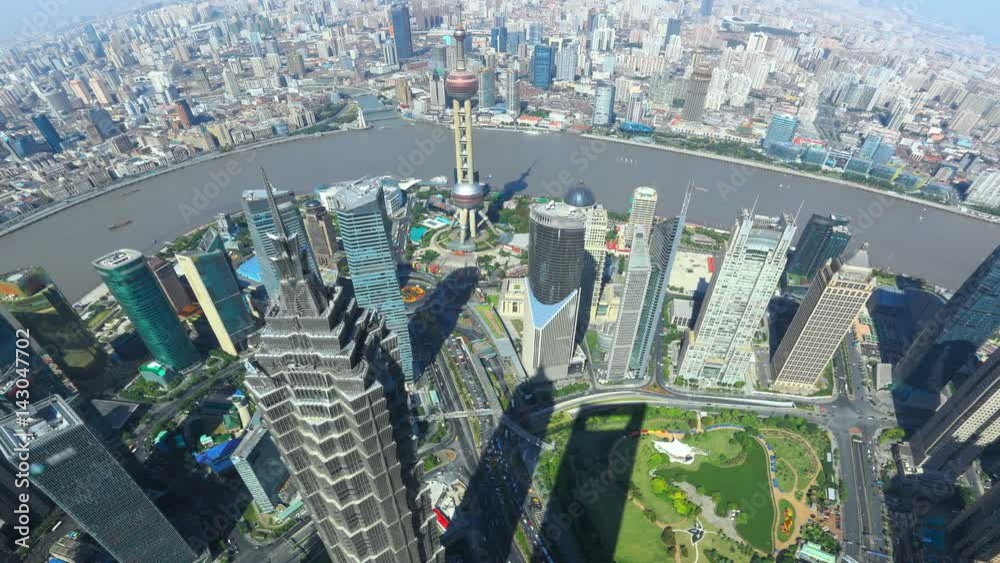 Shanghai, Time-Lapse. Elevated view of high-rise buildings with river ...