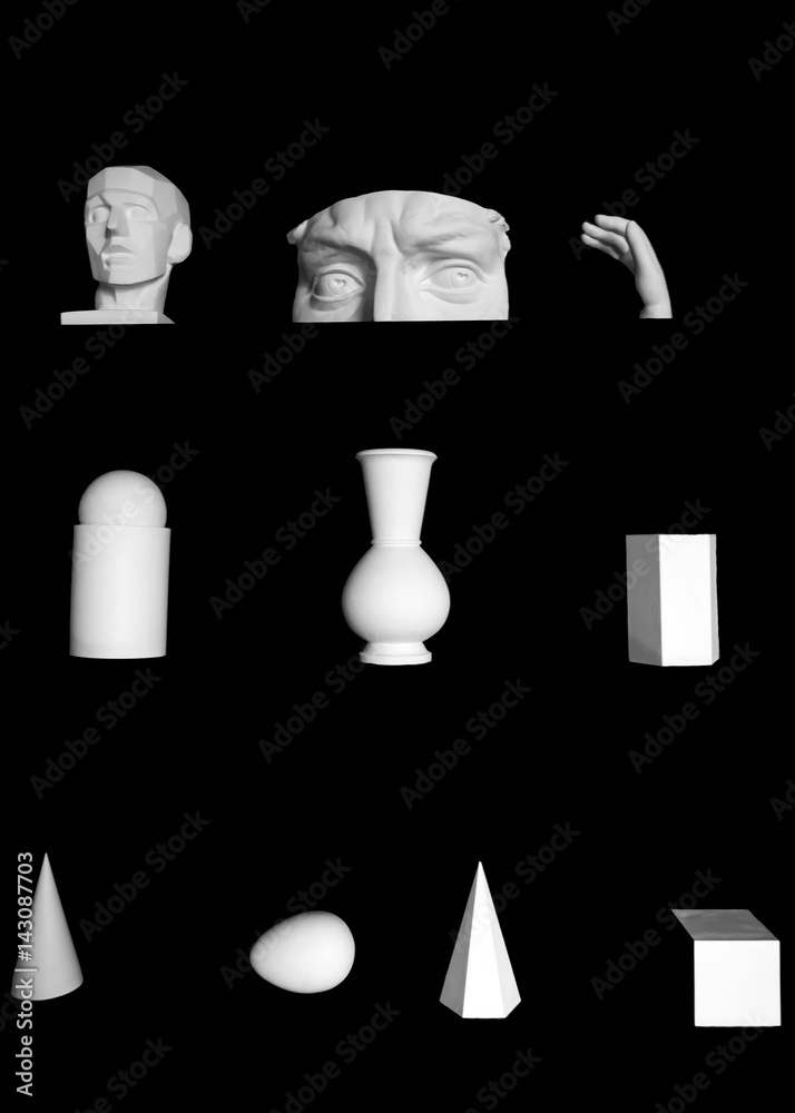 Plaster forms of figures on black background - the contrast of shapes ...