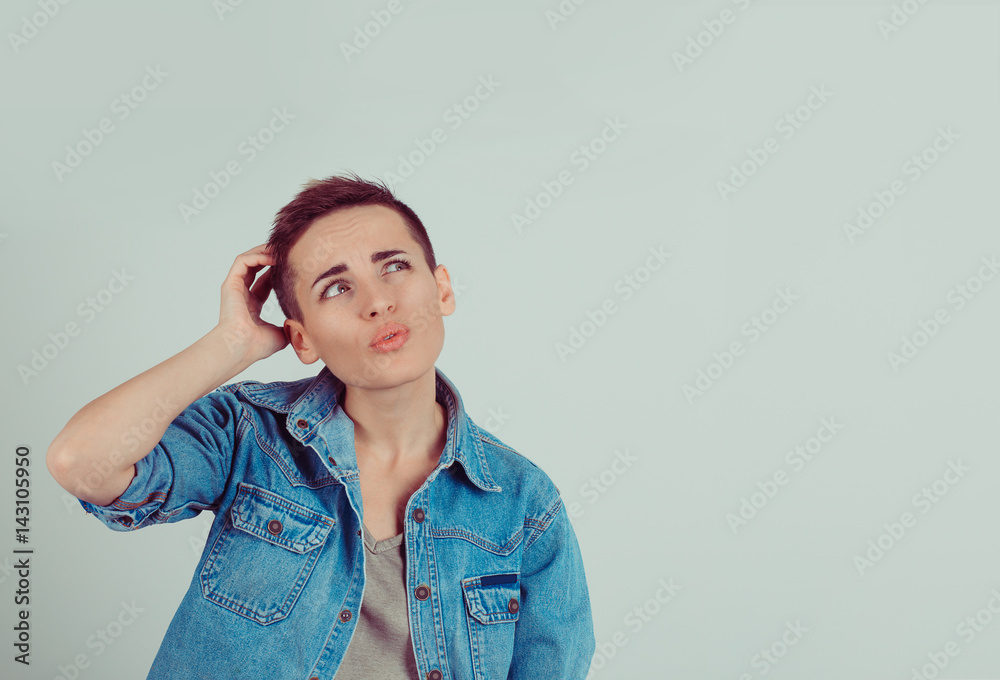 Closeup portrait young woman short hair scratching head, thinking ...