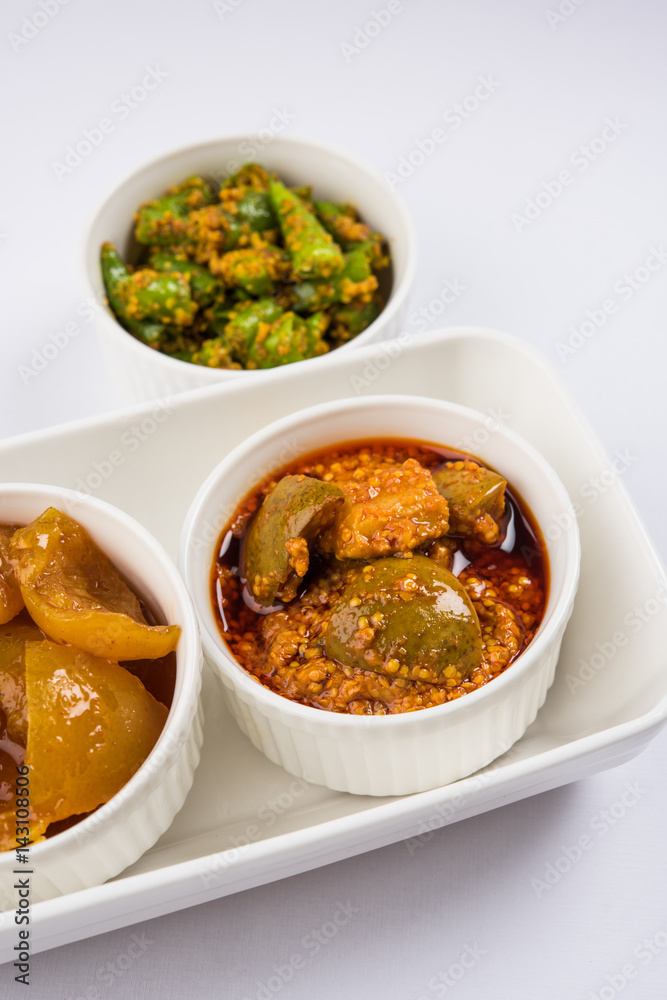 Group photograph of indian pickles like mango pickle , lemon pickle and ...