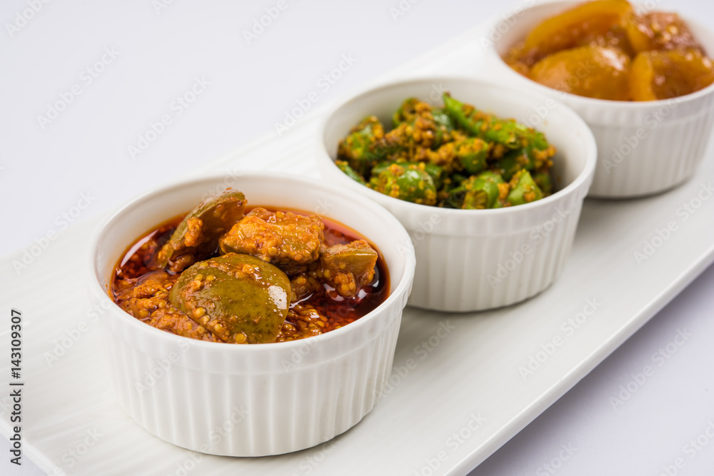 Group photograph of indian pickles like mango pickle , lemon pickle and ...