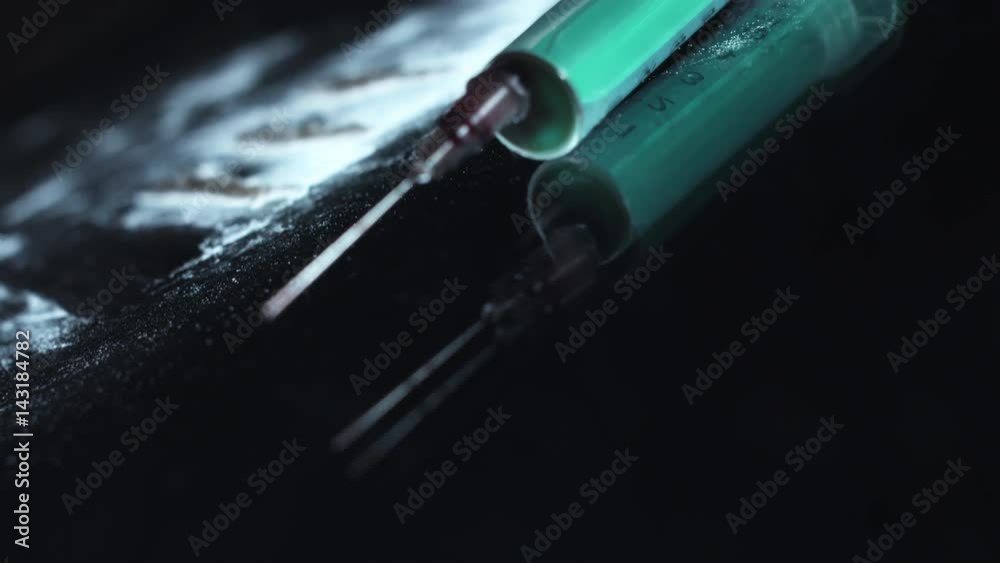 4k Close-up of Drugs Cocaine Lanes and Syringe Stock Video | Adobe Stock