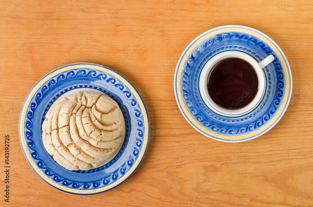 Mexican Concha sweet bread with coffee cup Stock Photo | Adobe Stock