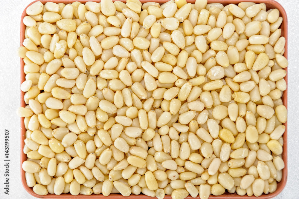 Shelled pine nuts Stock Photo | Adobe Stock