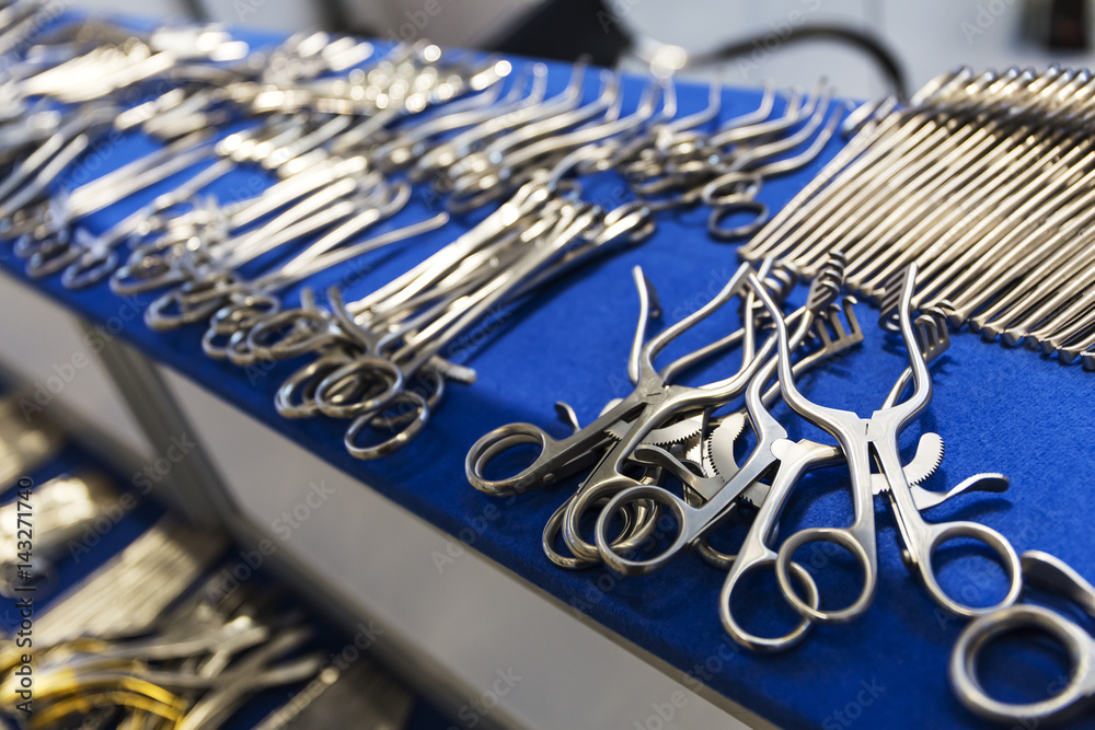surgical instruments and tools including scalpels, forceps and tweezers ...