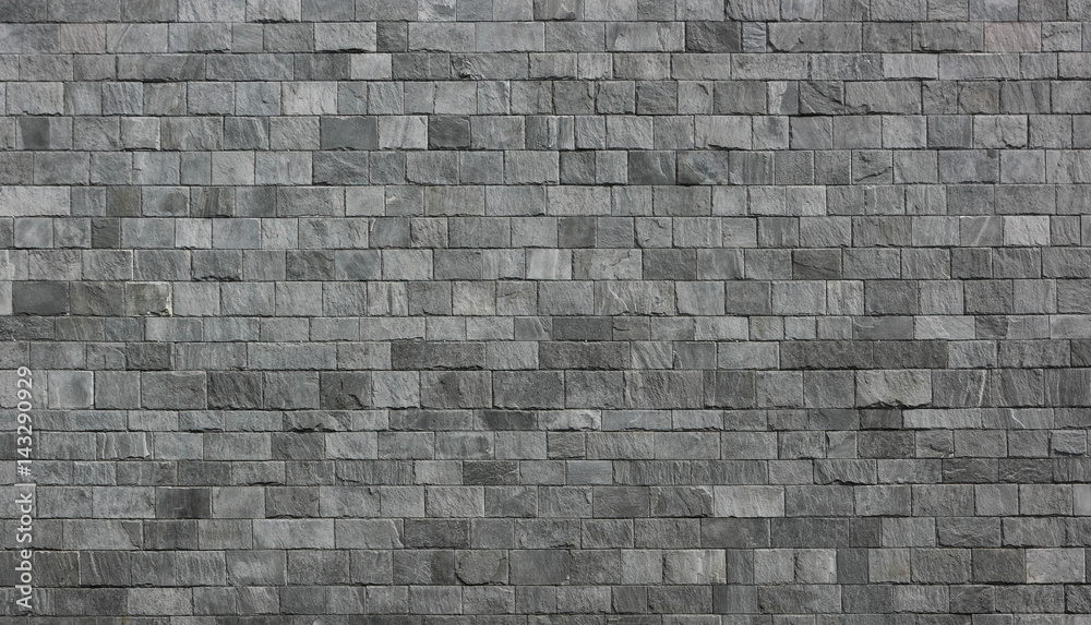 Stone wall as a background or texture. An example of masonry as a ...