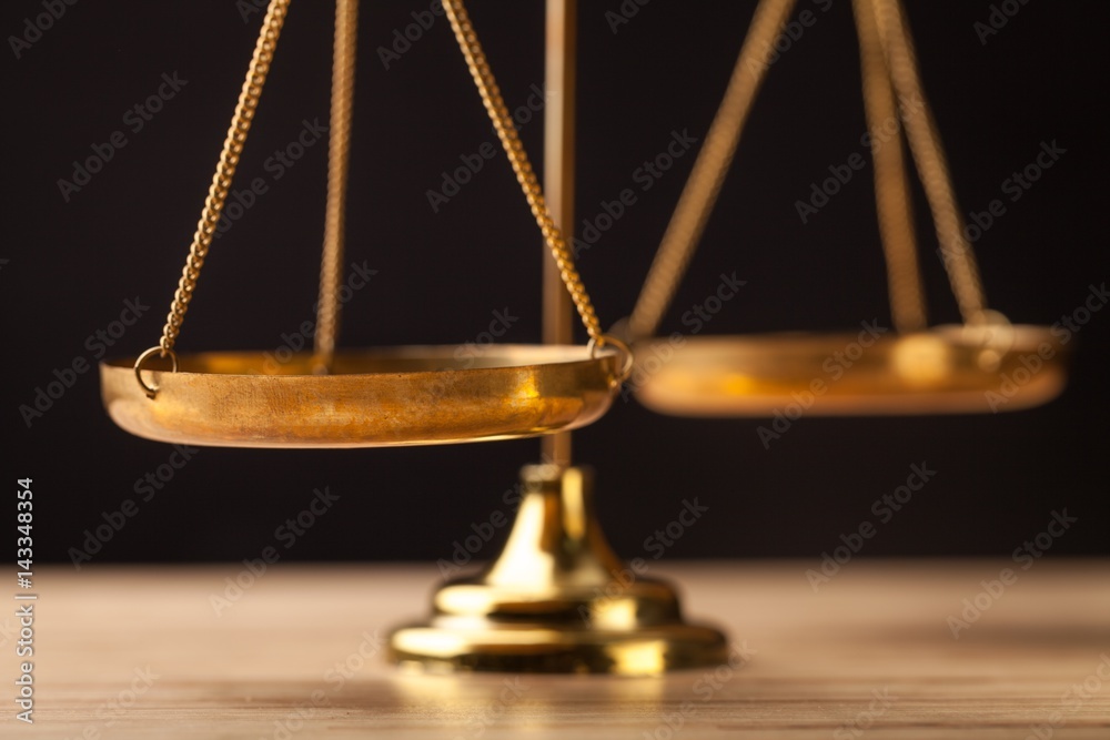 Scale of justice. Stock Photo | Adobe Stock