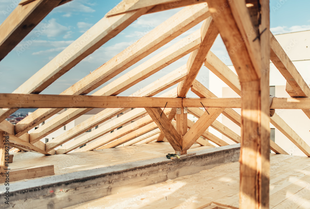 Architectural details of inside of attic, wooden roof system at ...