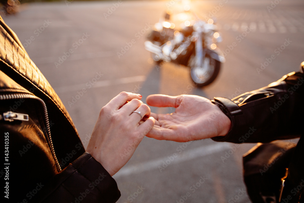 Motorcycle Couple Holding Hands