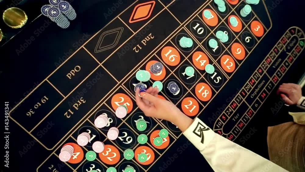 casino: roulette players at the table, top view. Stock Video | Adobe Stock