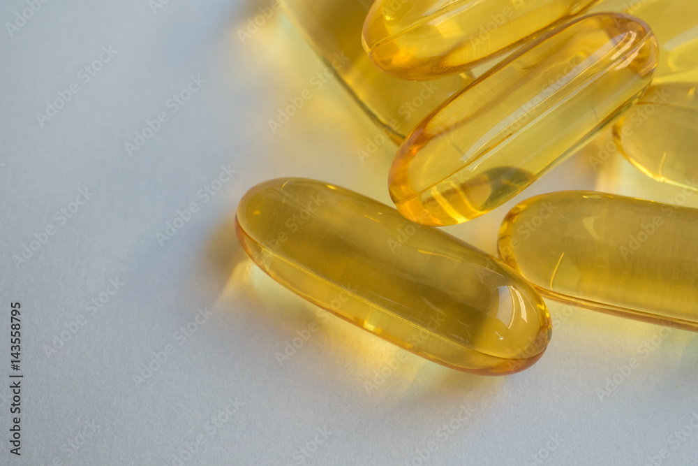 fish oil on white background. Stock Photo | Adobe Stock