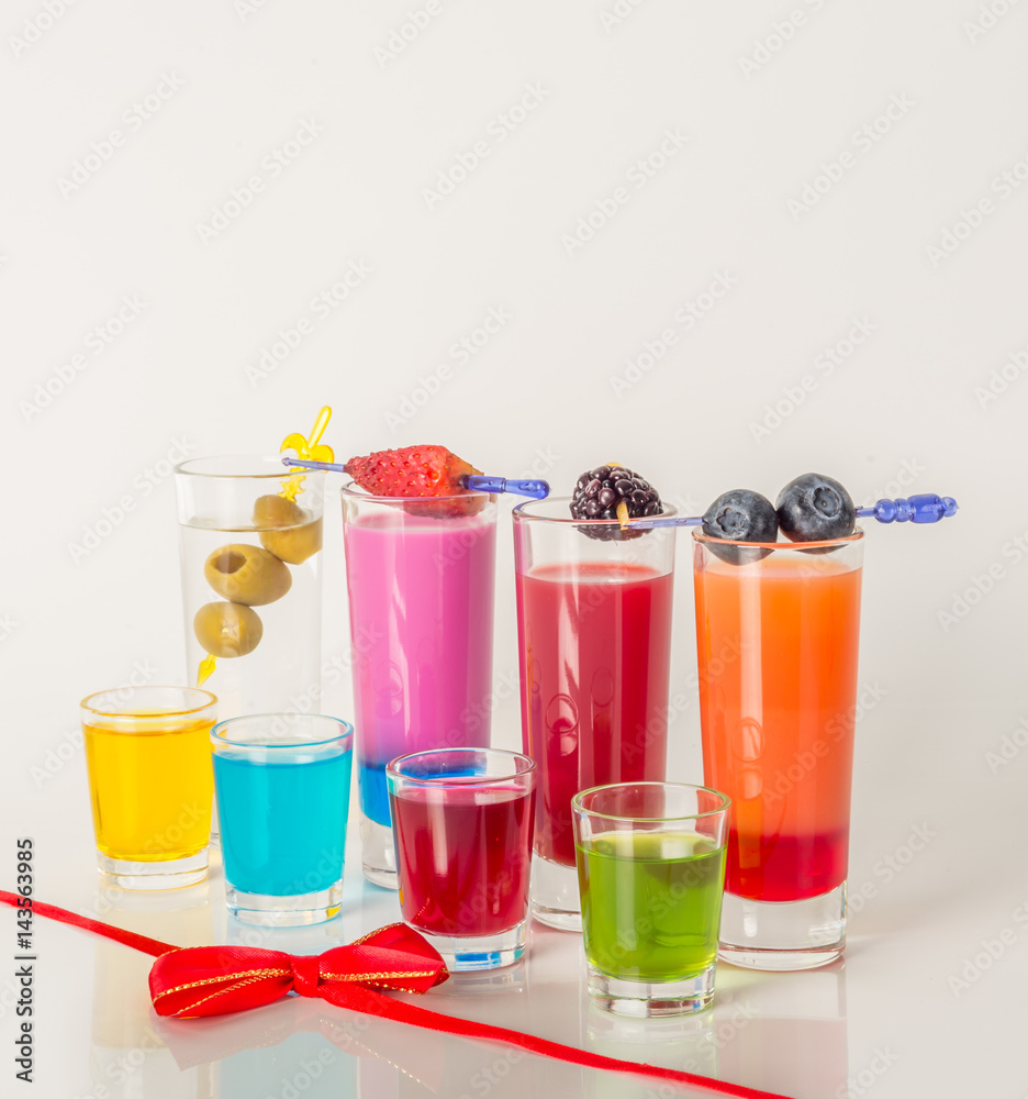 Colorful set of drinks, color drink decorated with fruit, color shots ...
