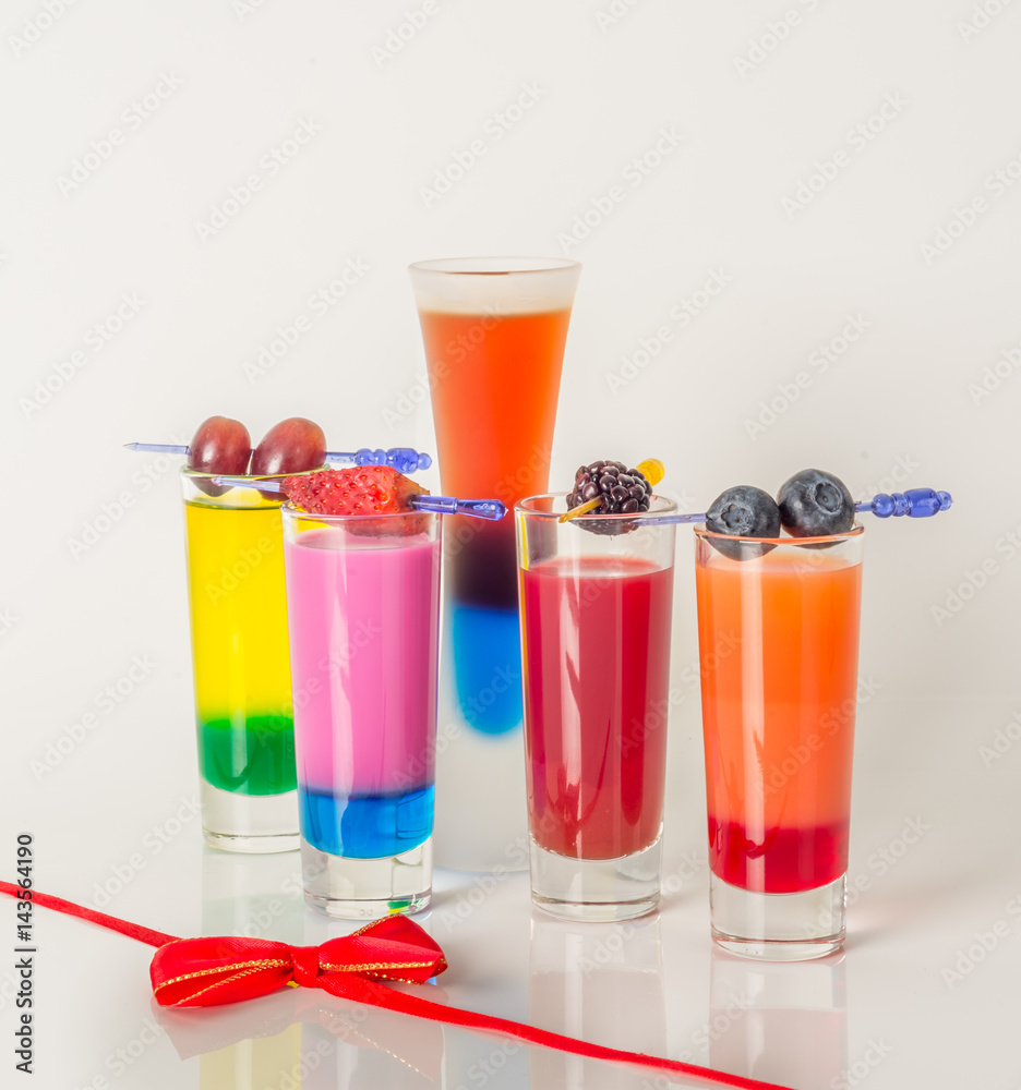 Colorful set of drinks, color drink decorated with fruit, color shots ...