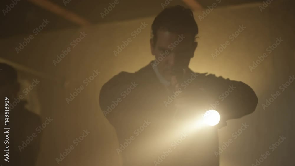 Police detectives with handguns & flashlights investigating gloomy ...