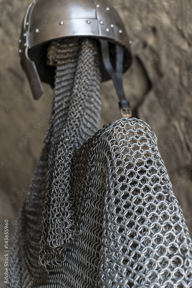 Helmet, chainmail, sword and shields of a medieval armor knight ready ...