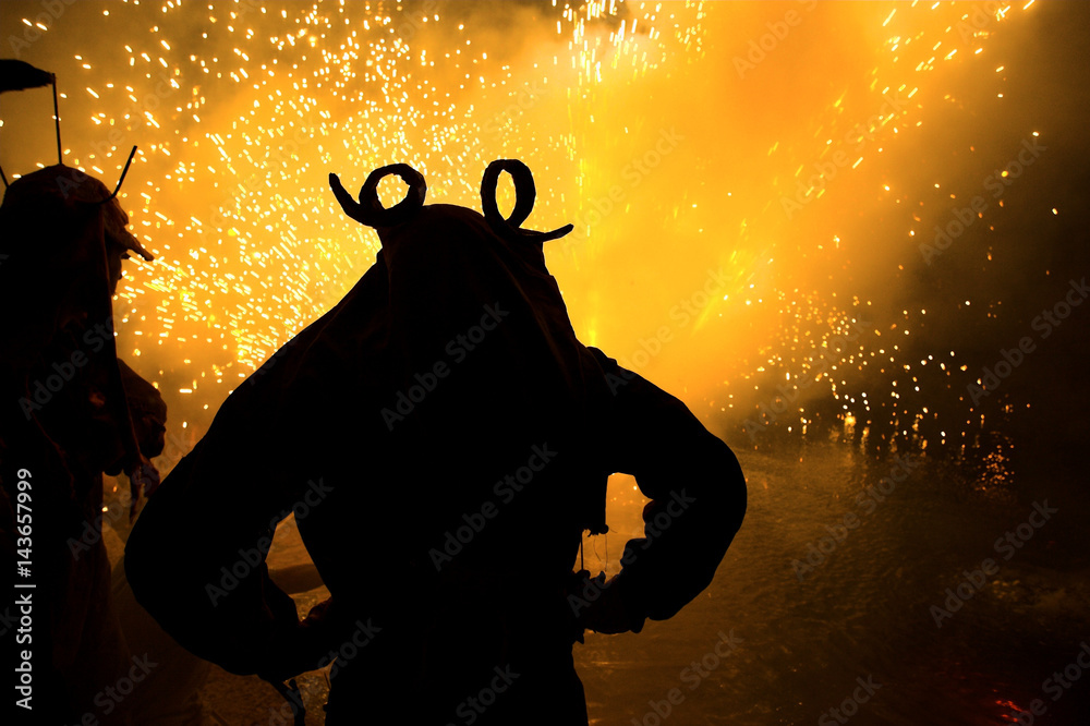 Demonio contemplando el fuego Stock Photo | Adobe Stock