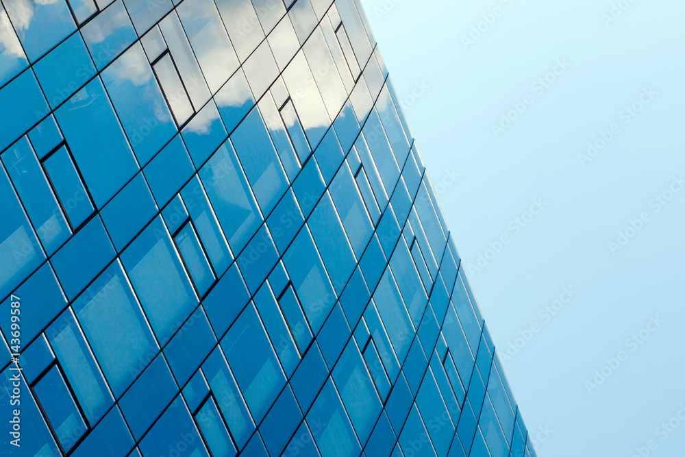 Facade glass building background on a blue sky. Concept for financial ...