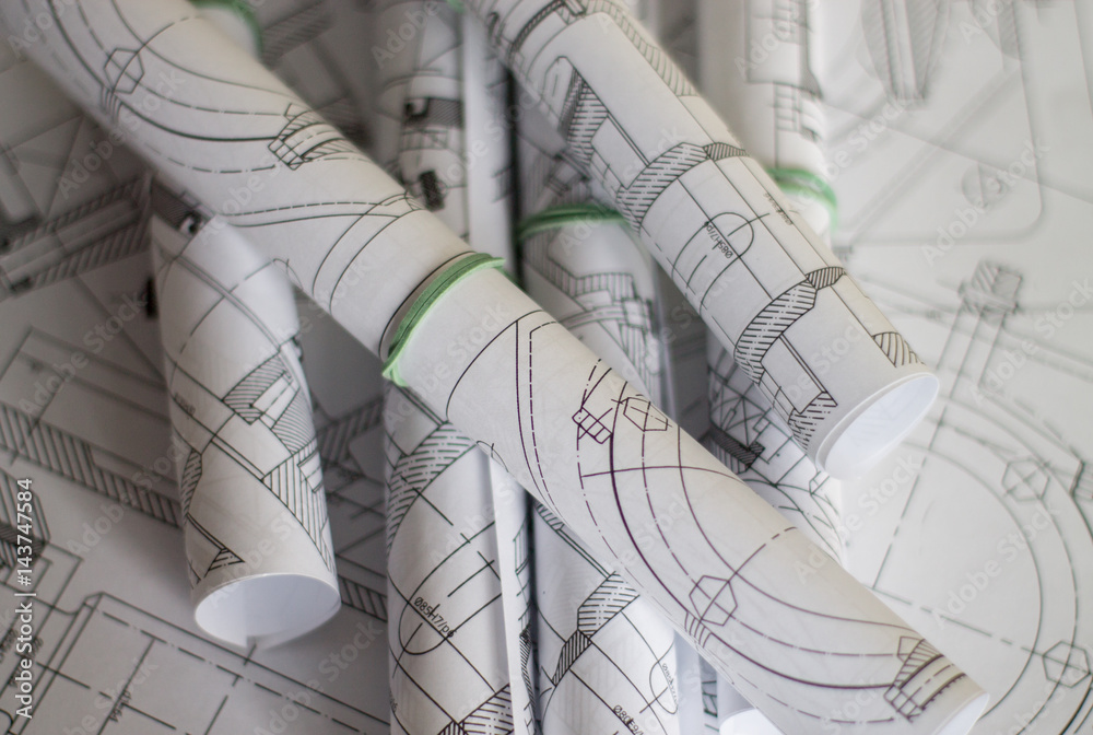 Engineering drawings on paper. Several drawings in a roll. Stock Photo ...