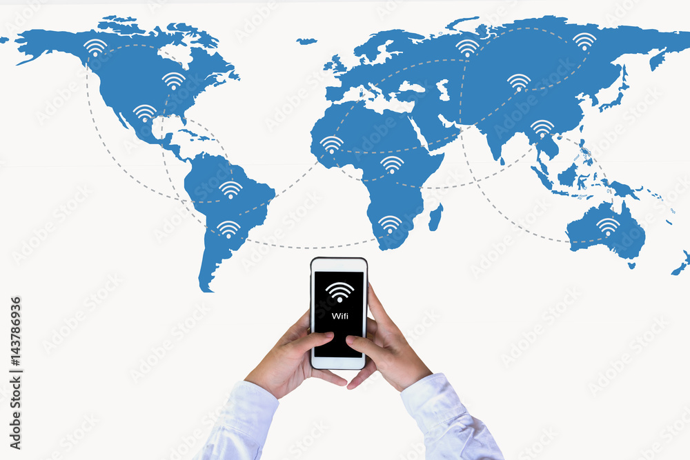 Hand holding smart phone on world map network and wireless ...