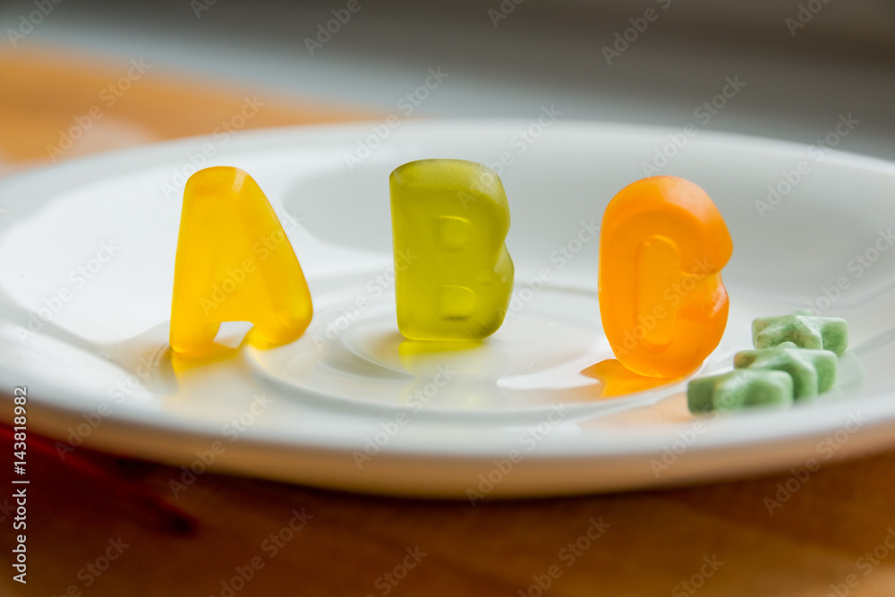 food sweet letters. Sweet alphabet. ABC text, Message lined with edible ...