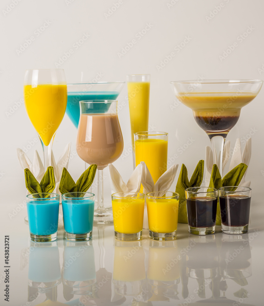 Colorful drinks based on milk liqueurs, unique pastel colors of drinks ...